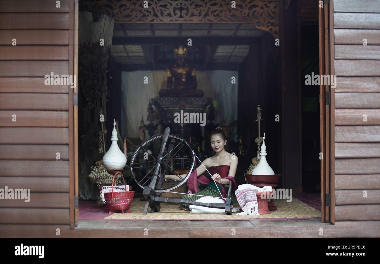 Thai Lanna traditionally dressed women in the Old Lanna house in Chiang ...