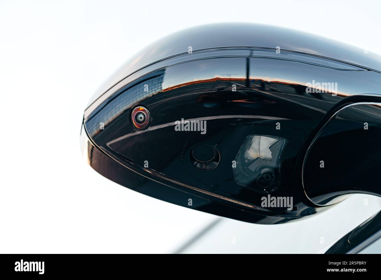 Side view of a mirror of a modern luxury car Stock Photo - Alamy