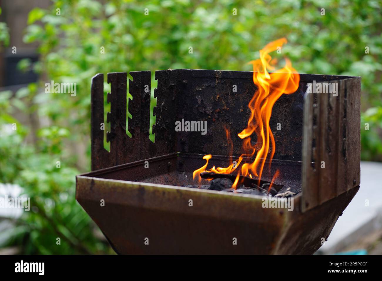 BBQ grill flame burning fire, barbecue outdoors for cooking food in ...