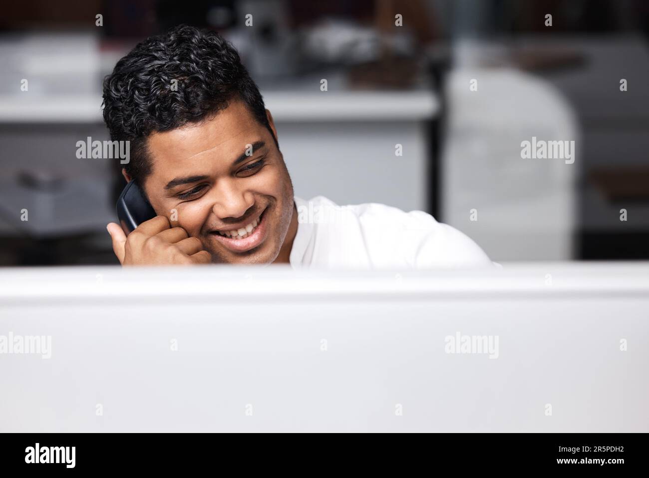 Telephone, call and happy business man in office talking, smile and ...
