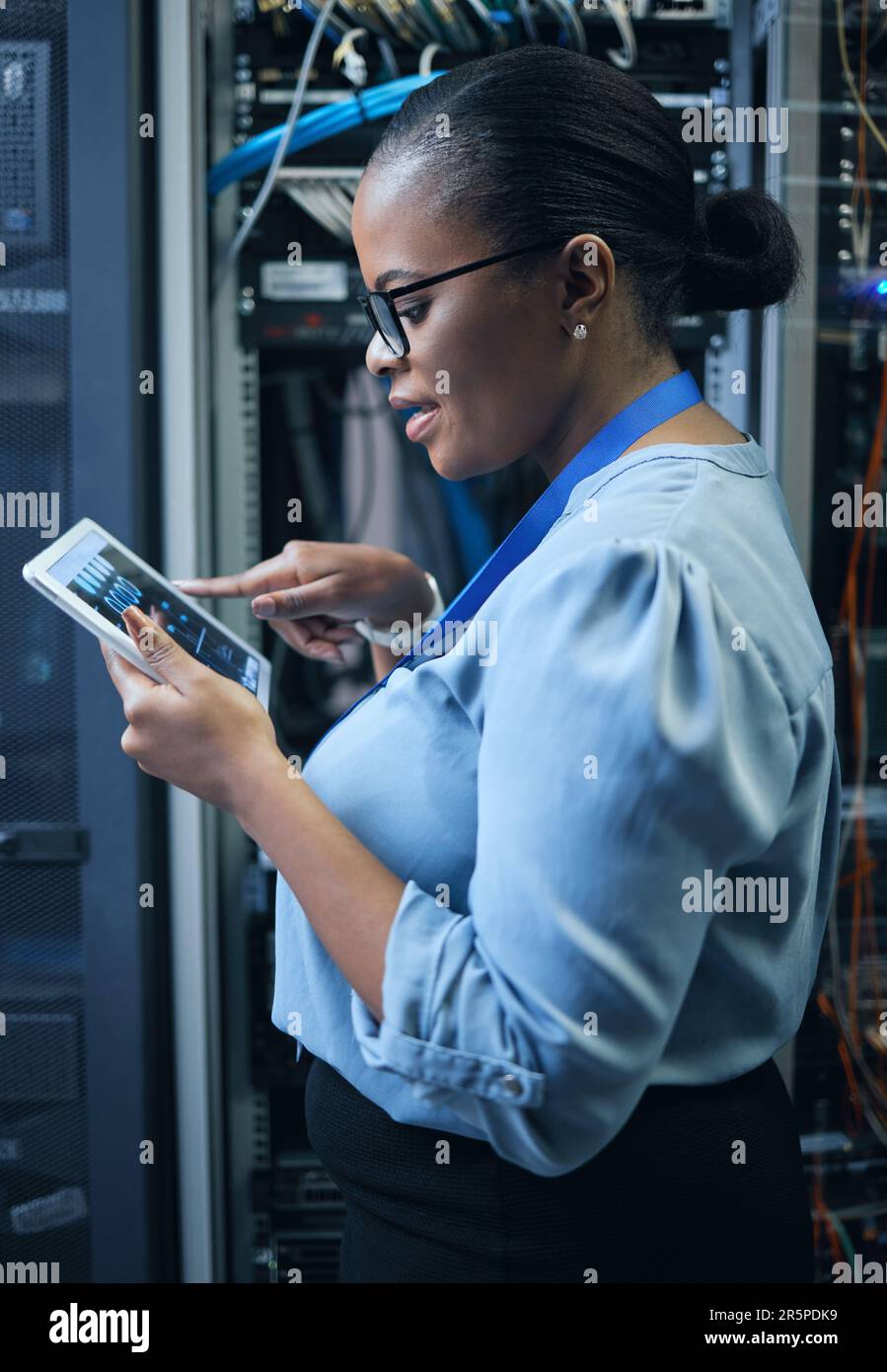IT woman, engineer and tablet in a server room for programming ...