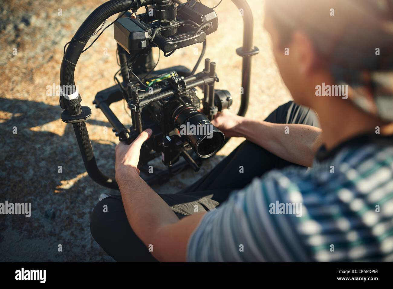 Just making a quick adjustment. Over the shoulder shot of an ...