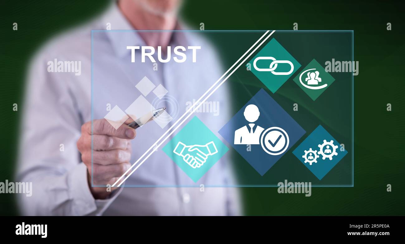 Man touching a trust concept on a touch screen with a pen Stock Photo ...