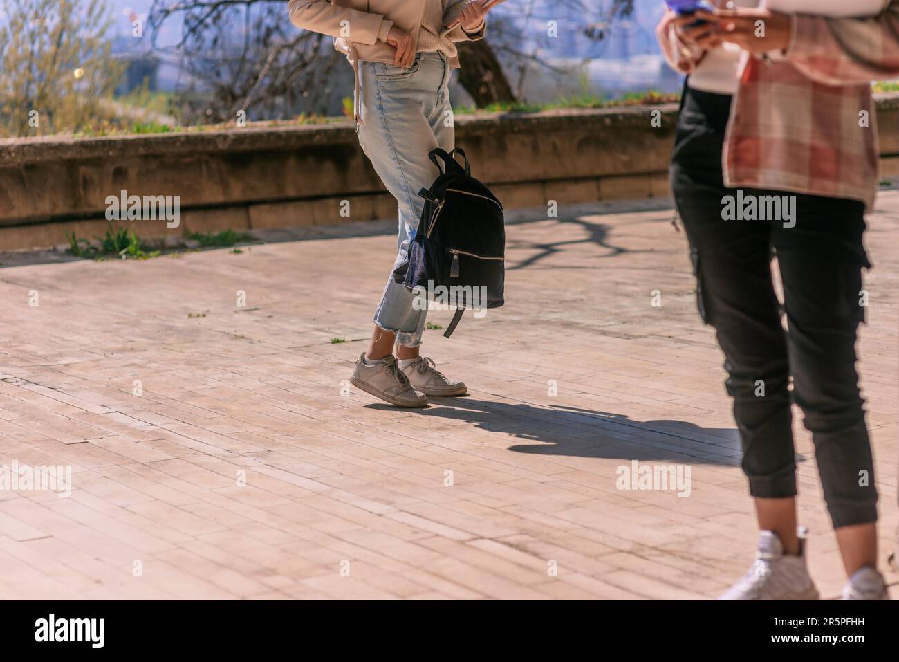 School bag slipped away from girls hands. School bag falling down Stock ...