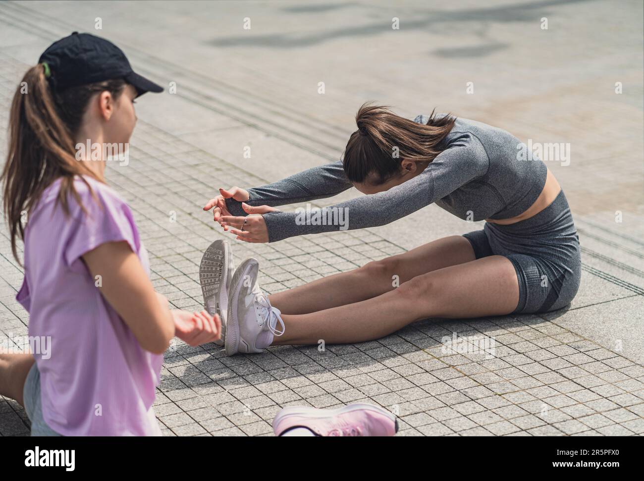 Sportsgirl stretching back hi-res stock photography and images - Alamy