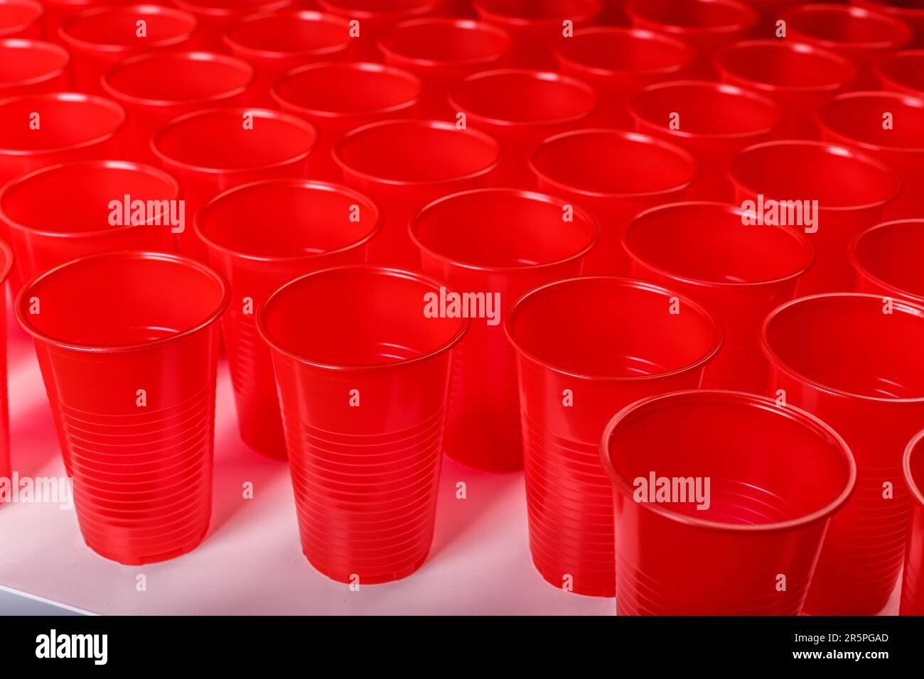 red disposable plastic glasses Stock Photo - Alamy
