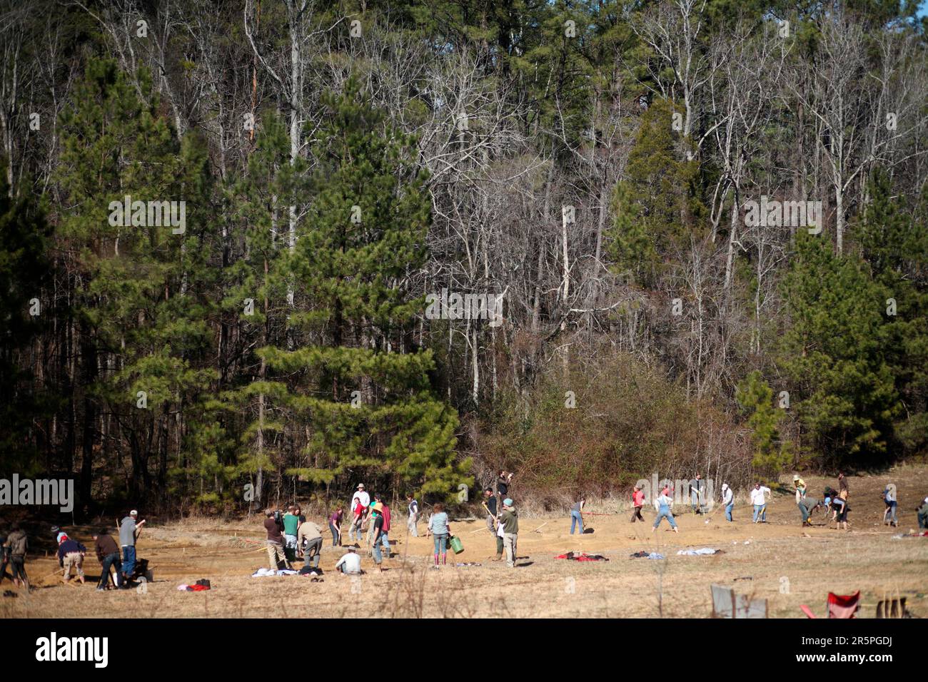 Farmers dig in mud hi-res stock photography and images - Alamy