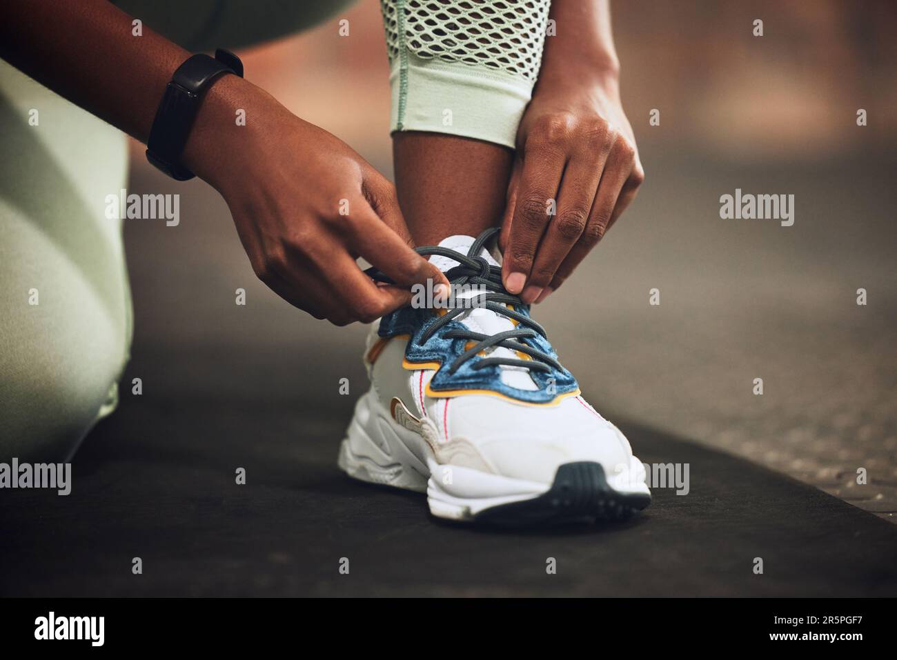 Lace, gym or hands of person with shoes at gym for training, exercise ...