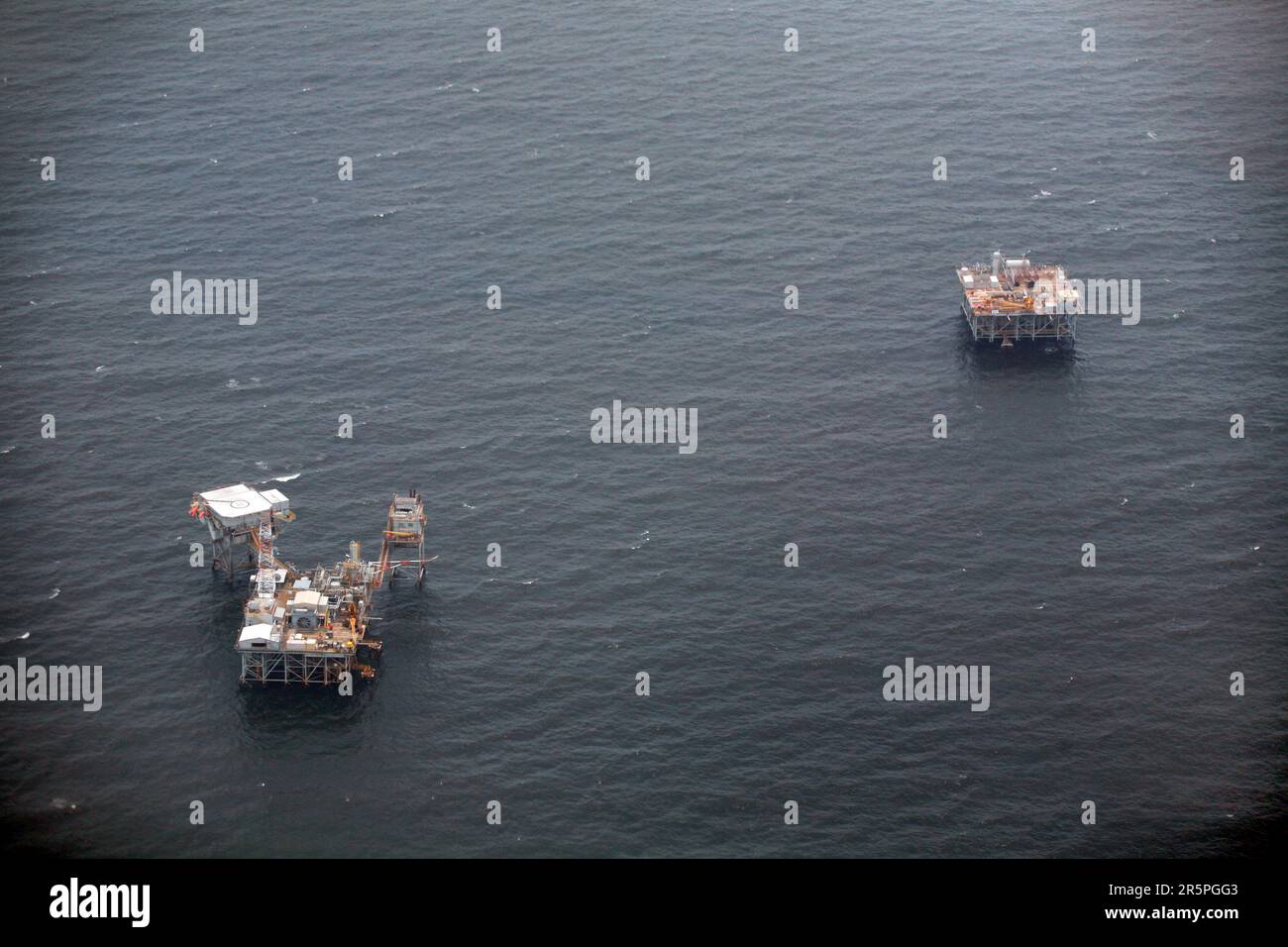Aerial view of oil rigs in the Gulf of Mexico off the coast of ...