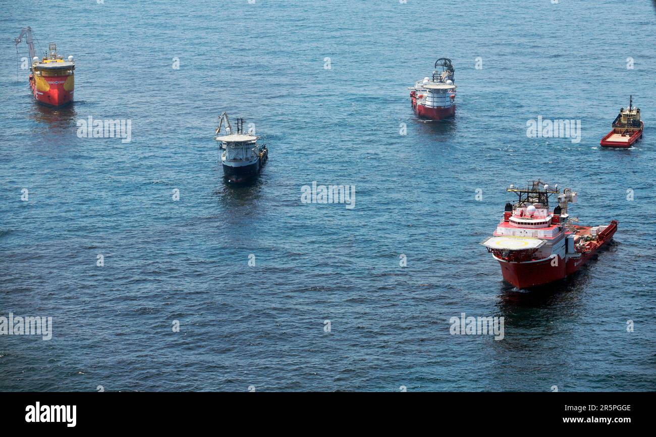 Aerial view of the ships surrounded by oily water in the Gulf of Mexico ...