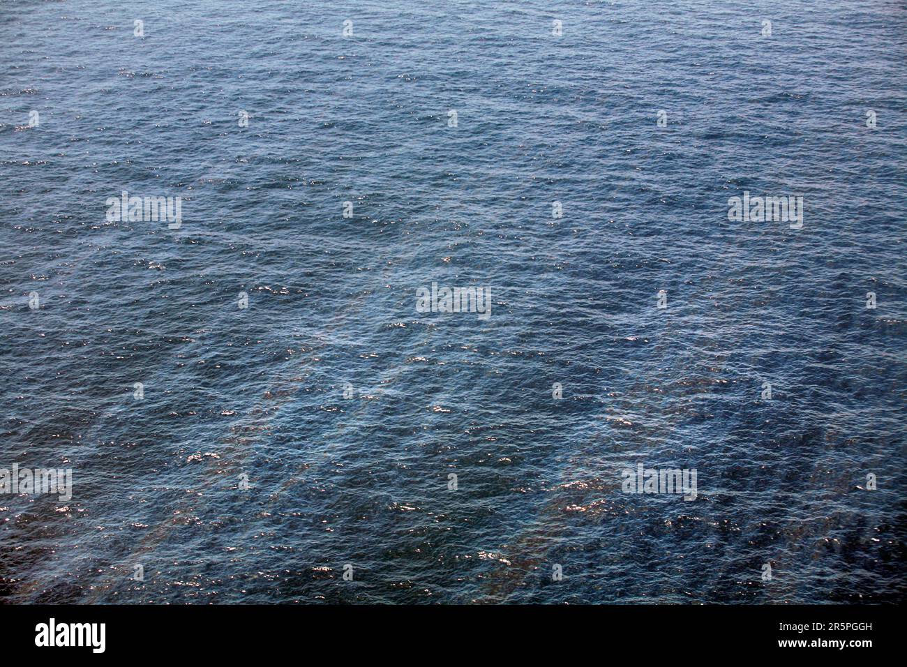 Ribbons of oil in Gulf waters look like tiger stripes high above the ...