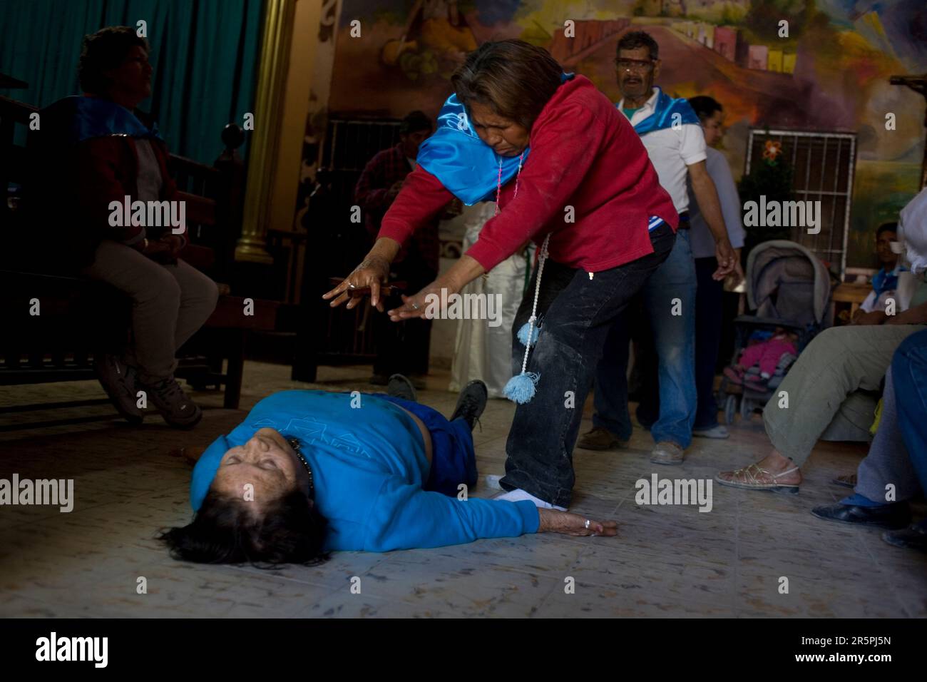 A medium performs a ritual to heal a pilgrim during Nino Fidencio ...
