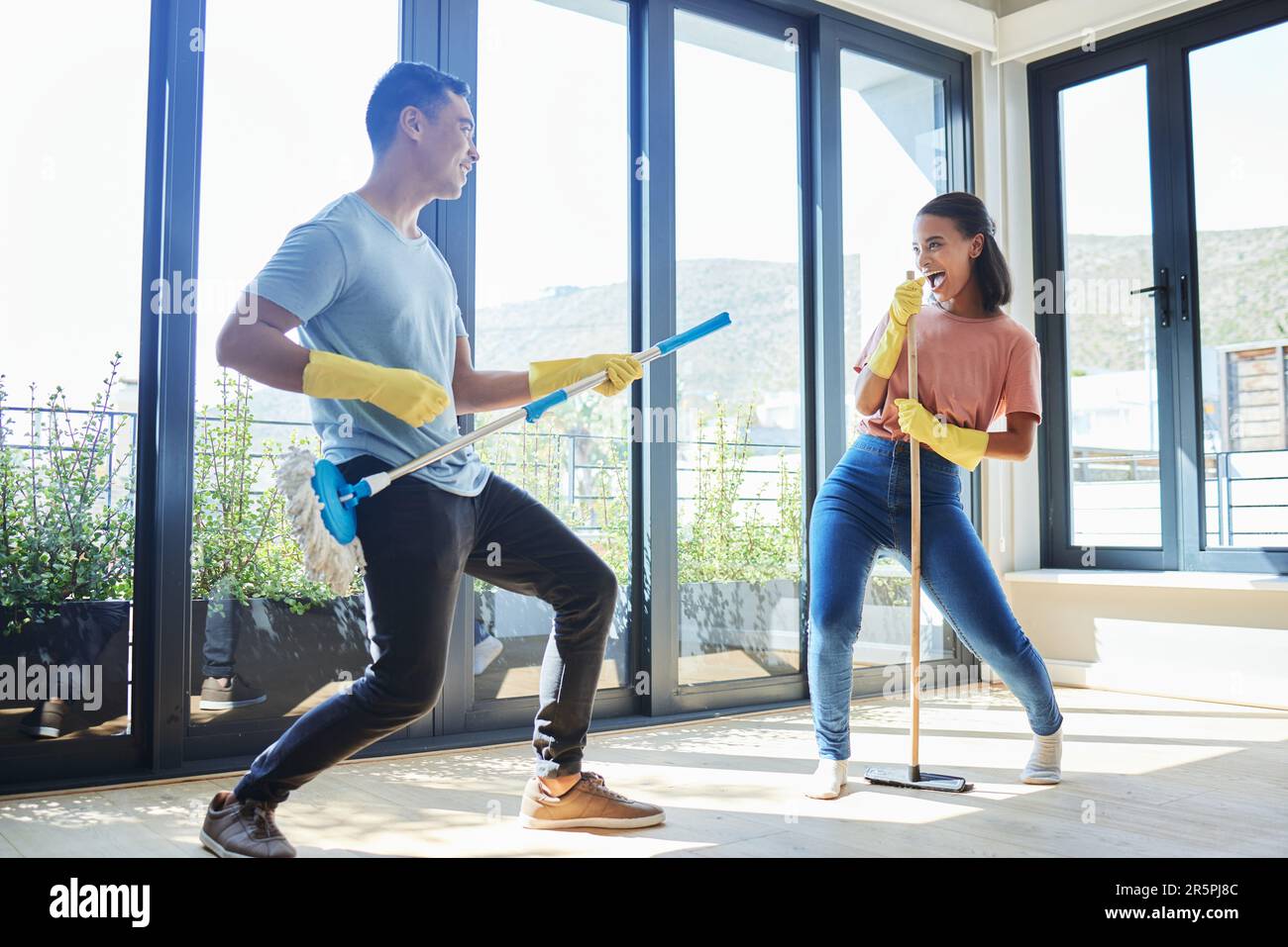 Man broom romance hi-res stock photography and images - Alamy