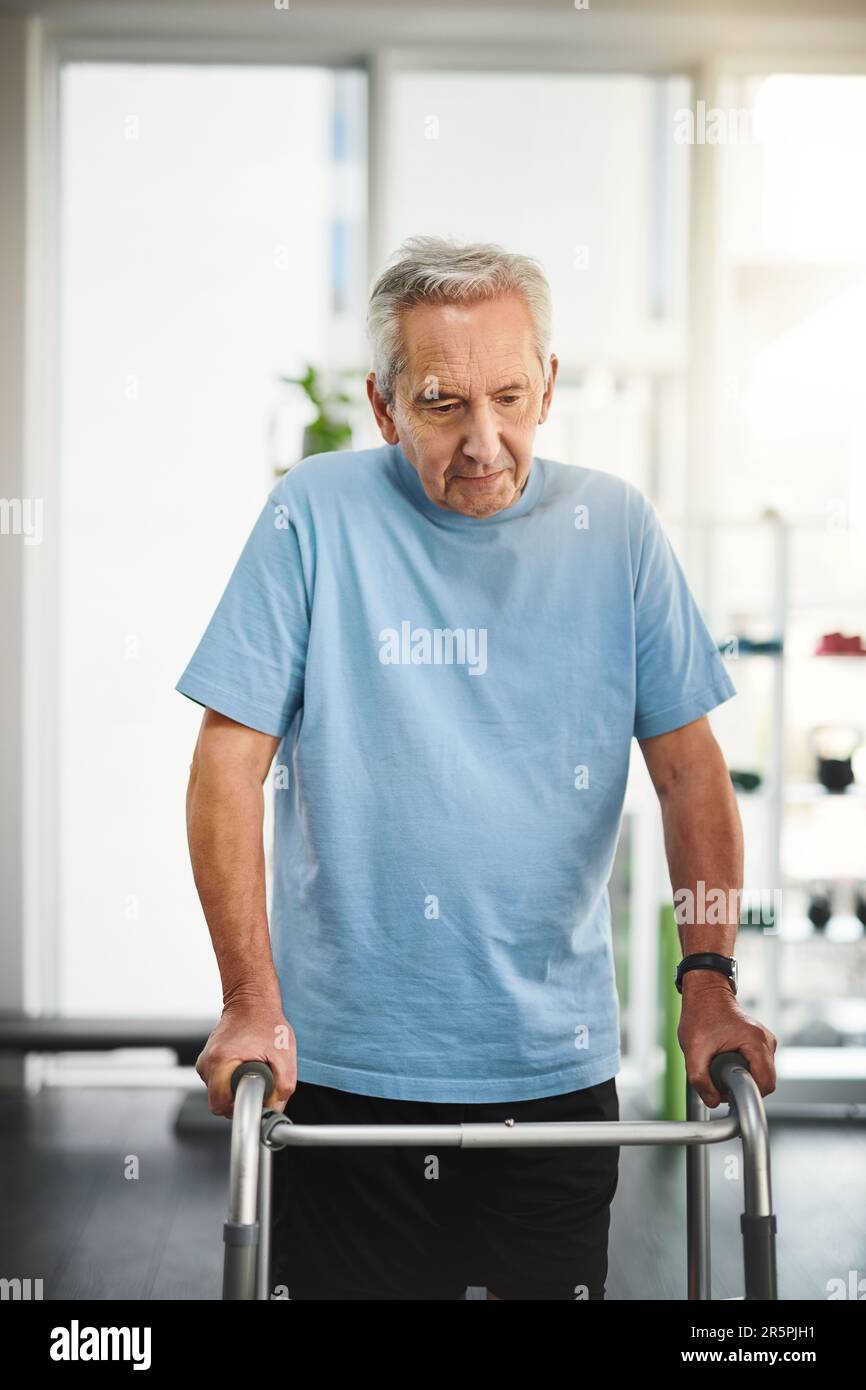 Each day brings me a step closer to better health. a senior man using a ...