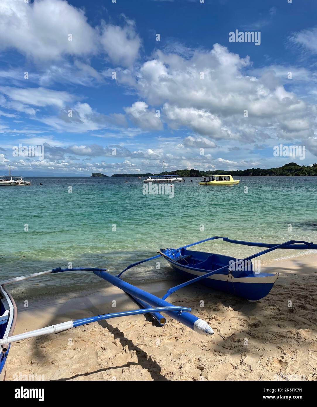Tiny Boat by the Sea Shore Stock Photo - Alamy