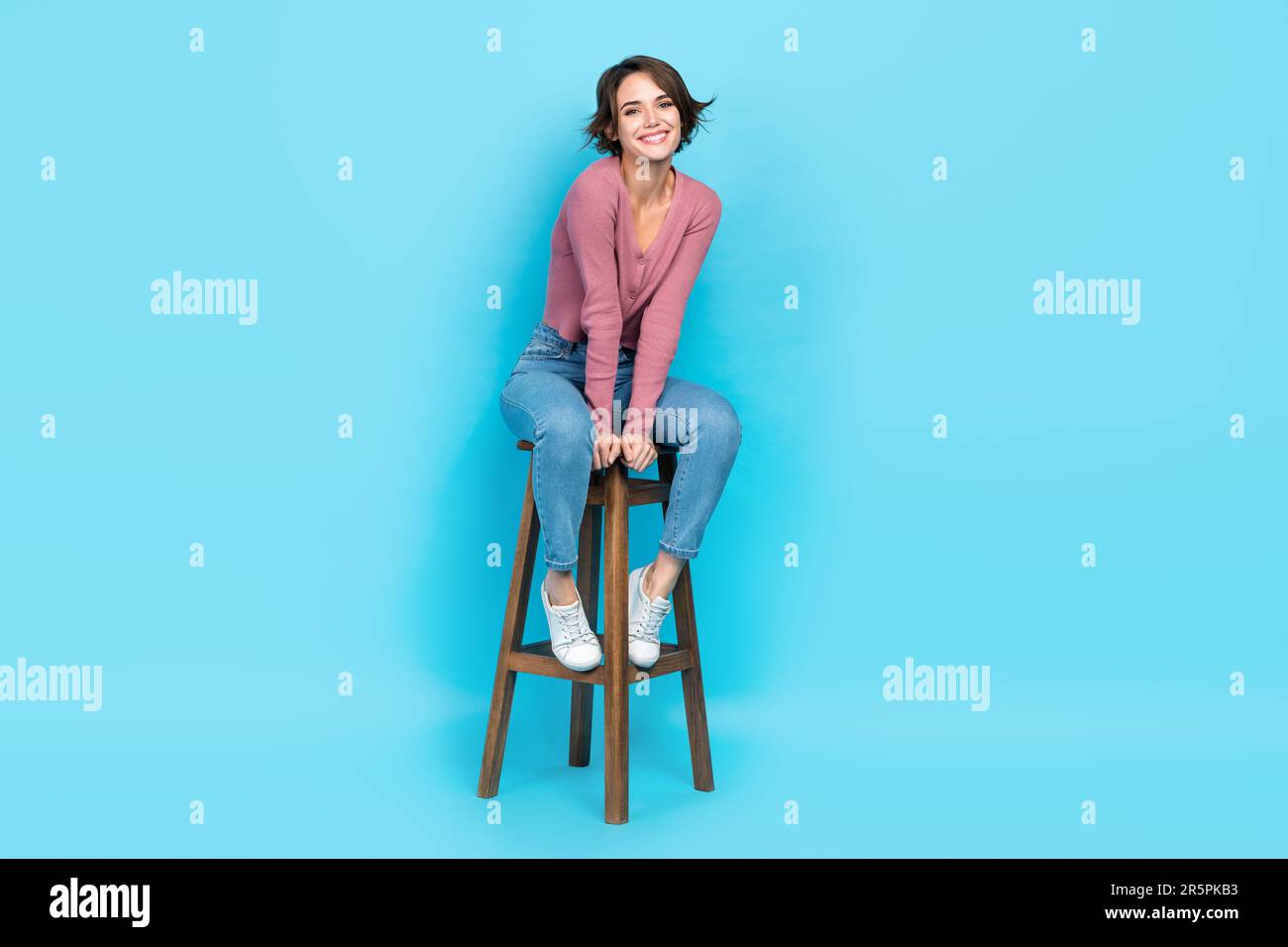 Full length photo of optimistic friendly girl wear pink cardigan denim ...