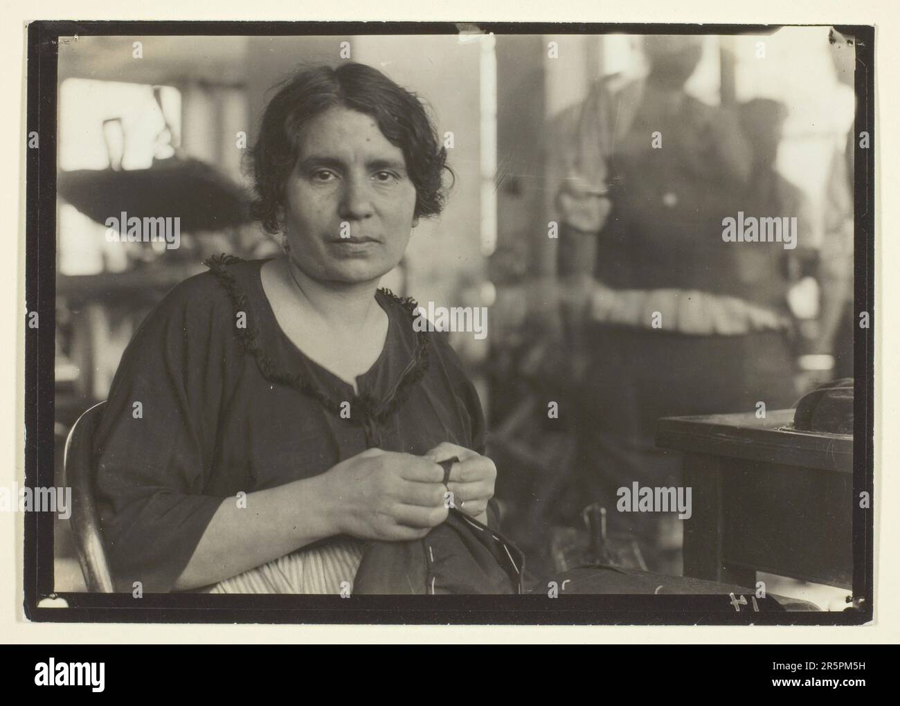 Early 1900s woman worker hi-res stock photography and images - Alamy