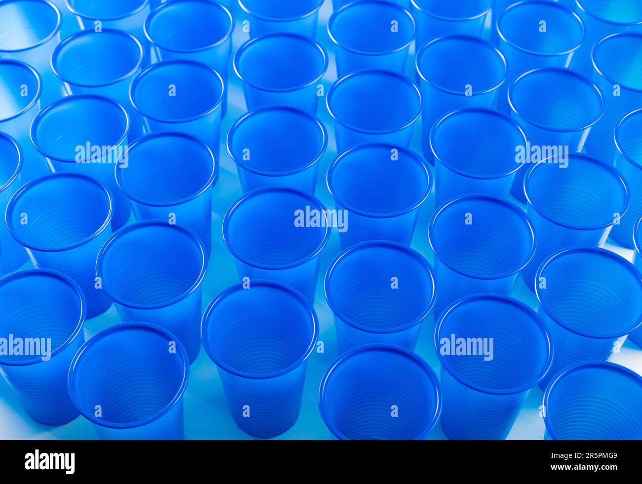 blue disposable plastic glasses Stock Photo - Alamy