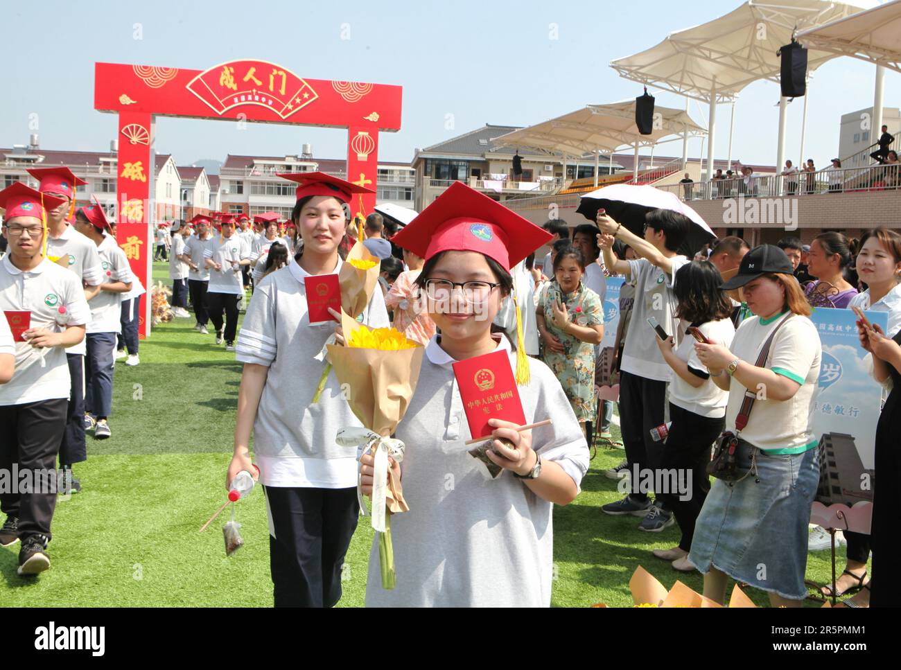 A graduation ceremony for senior high school students is held in ...