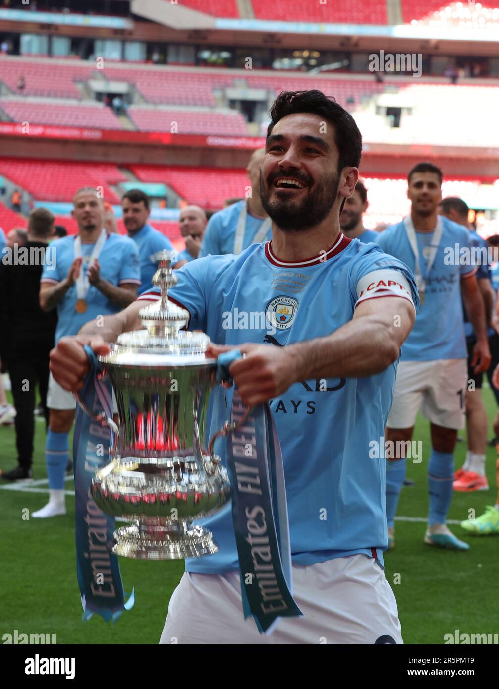 Manchester City's Likay Gundogan with FA Cup Trophy during The Emirates ...