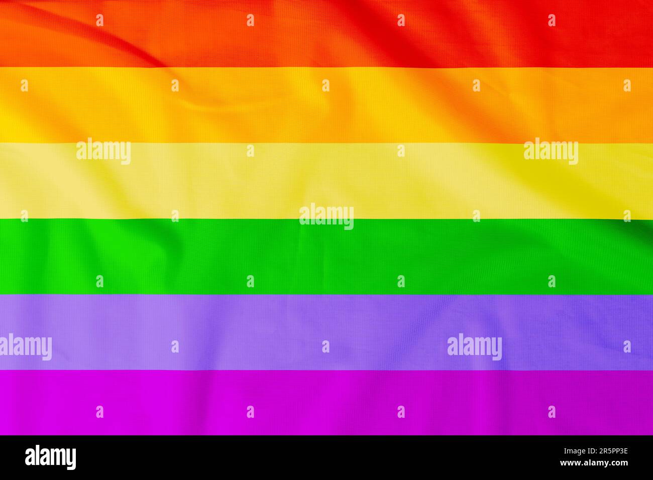 Flag of LGBT community with natural material creases as a background ...