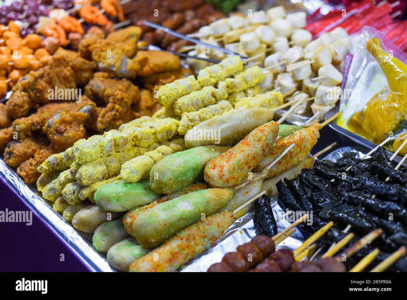Many snacks and seafood in vietnamese night market in food festival ...