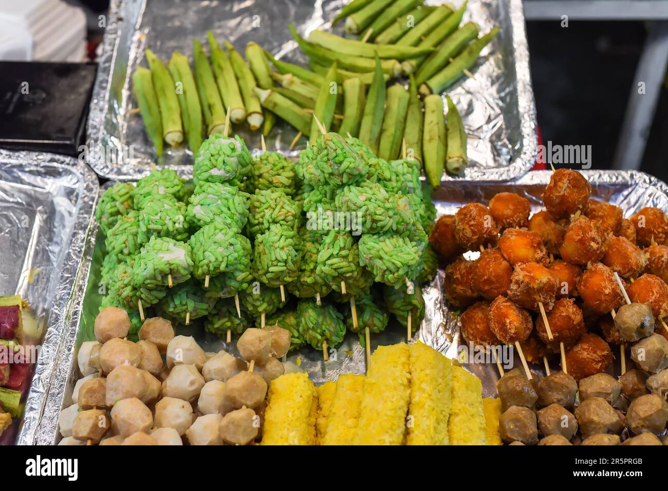 Many snacks and seafood in vietnamese night market in food festival ...