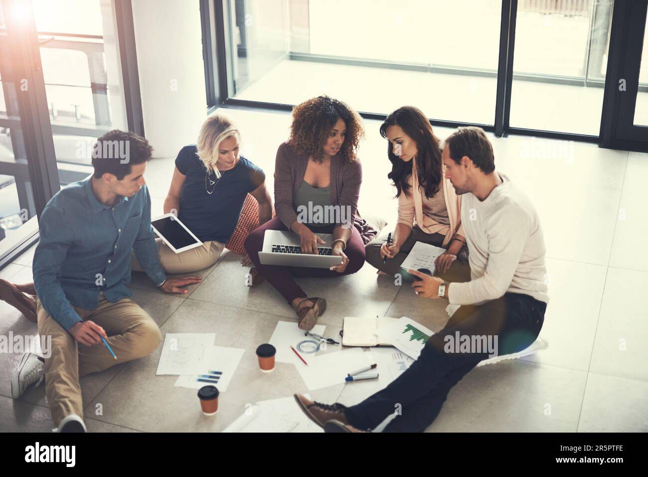 Analysing the pros and cons of their latest creative concepts. a team ...