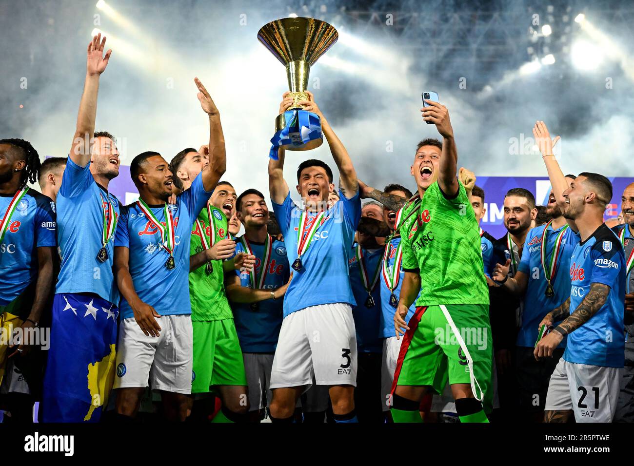 Kim Min-jae of SSC Napoli lifts the trophy as he celebrates with ...