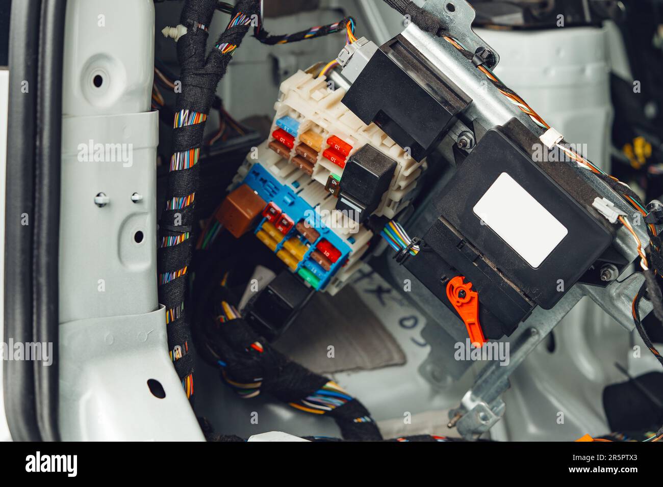 Electric wiring system with colorful wires in the car Stock Photo - Alamy