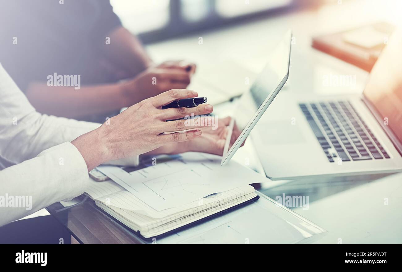 Smart resources for a smart collaboration. two colleagues using a ...