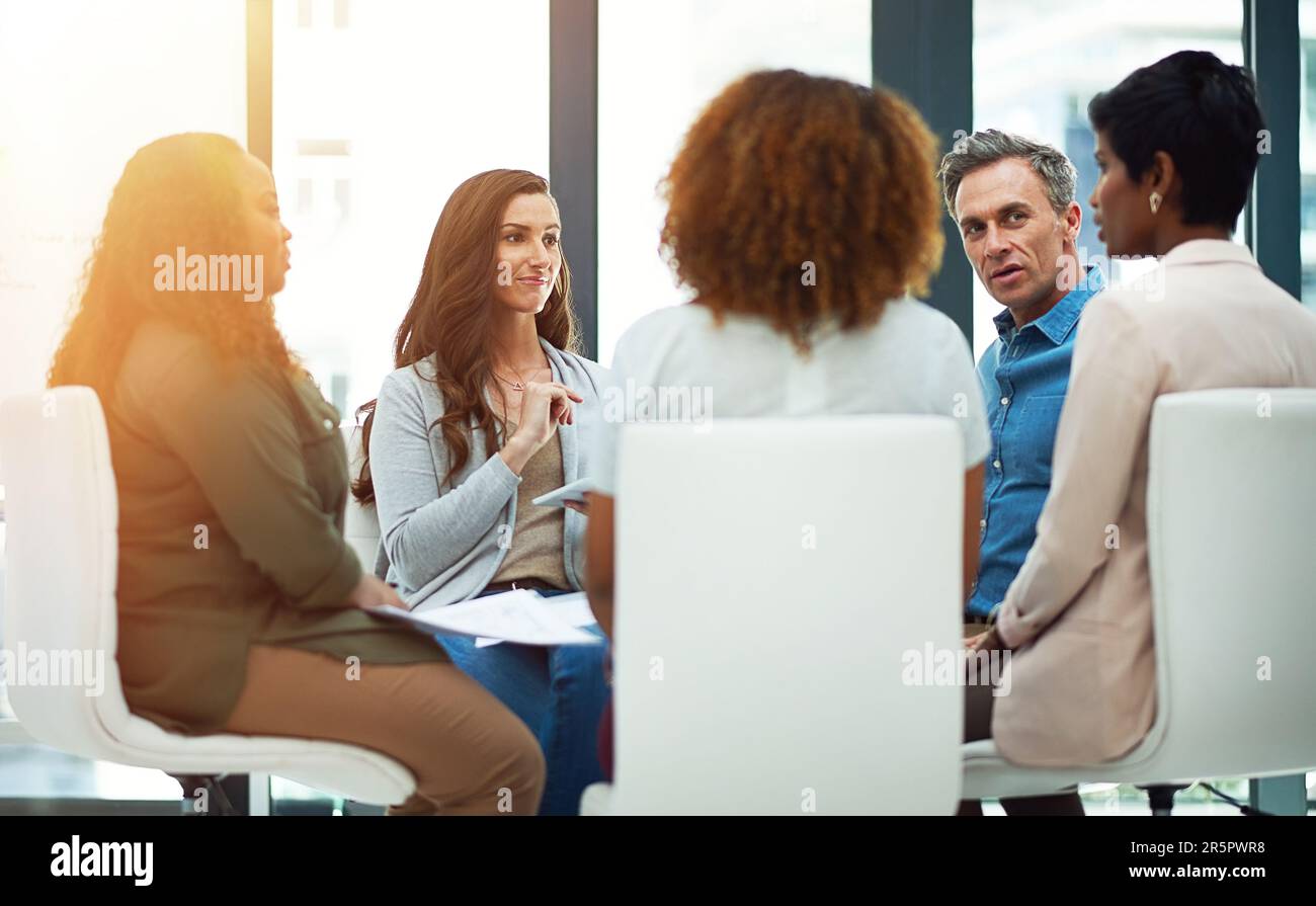 Problem solving. How the pros do it. a team of colleagues having a ...