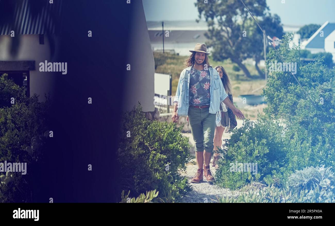 Exploring off the beaten track. an adventurous young couple exploring a ...