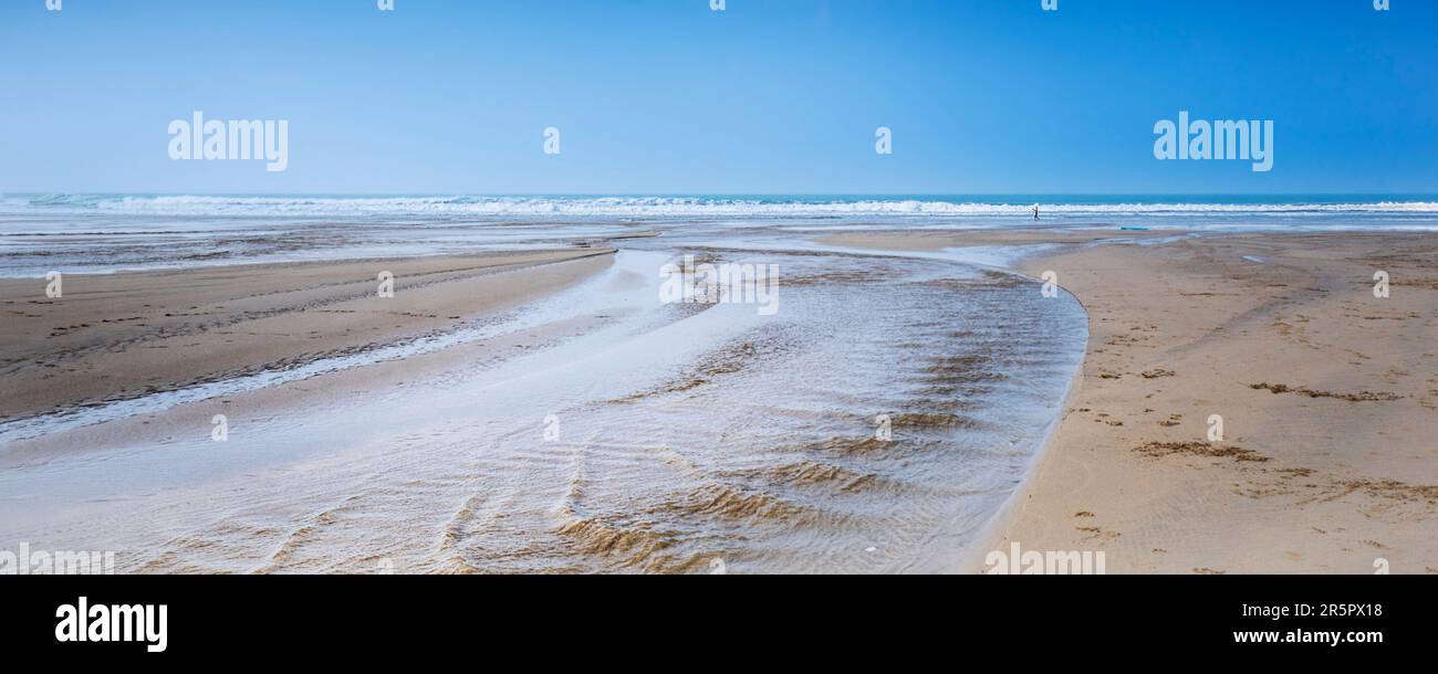 A panoramic image of the River Menalhyl flowing across Mawgan Porth ...