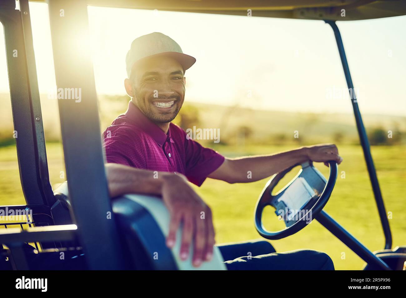 Ready for an awesome round of golf. Portrait of a happy young man ...