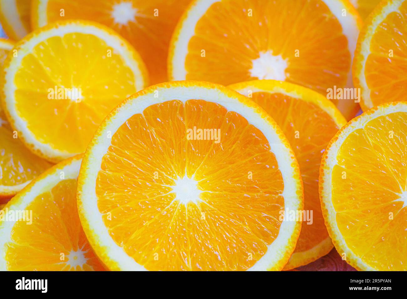 Round slices of fresh juicy oranges close-up. Bright fruity background ...