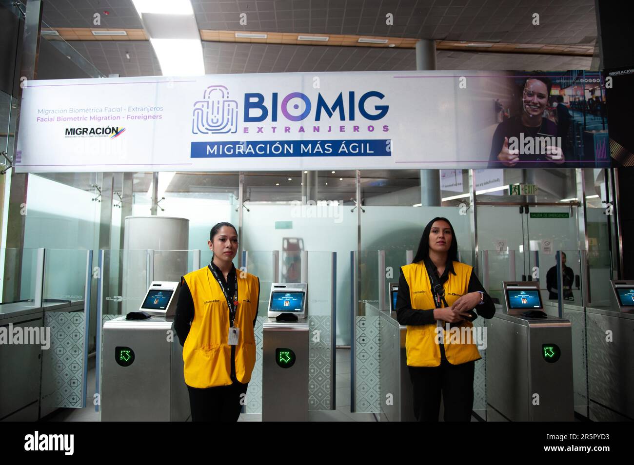 El Dorado INT Airport inform staff stand in front of the biometric ...