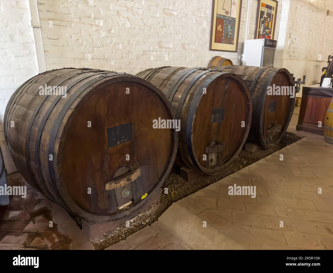 Vintage oaken wine casks in the museum at La Abjea Winery, San Rafael ...