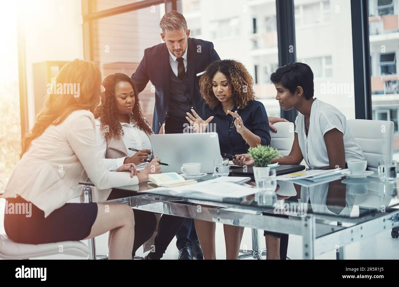 They respect each others contributions. a group of colleagues having a ...