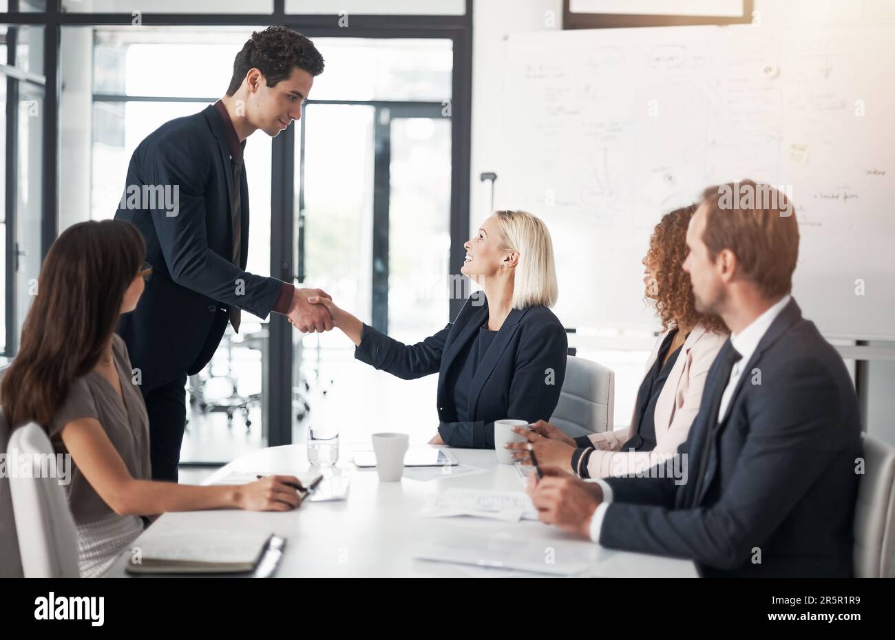 I look forward to collaborating together. businesspeople shaking hands ...