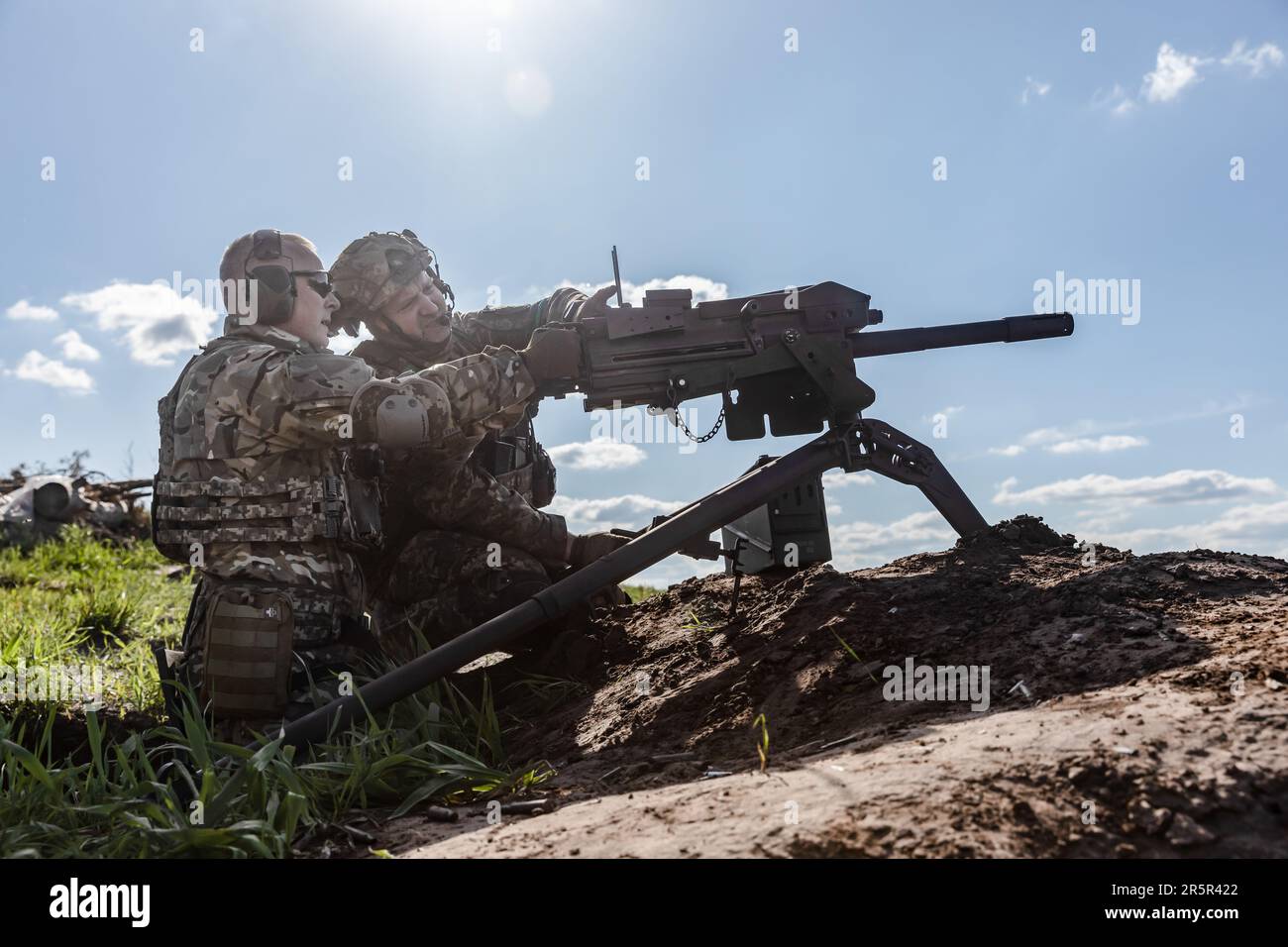 Ukrainian Armed Forces soldiers at a firing position prepare to fire ...
