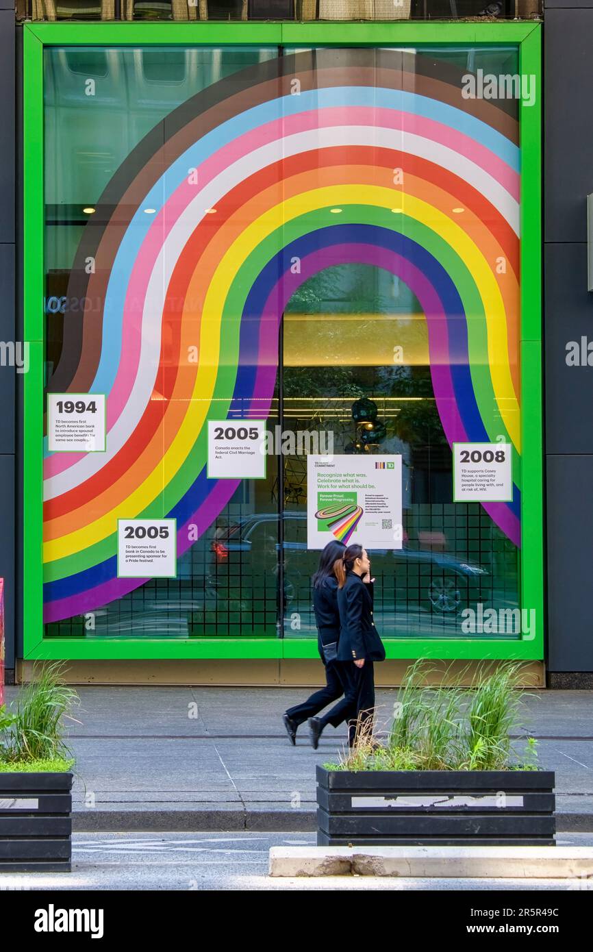 A large Pride rainbow colors on a TD or Toronto Dominion Bank glass ...