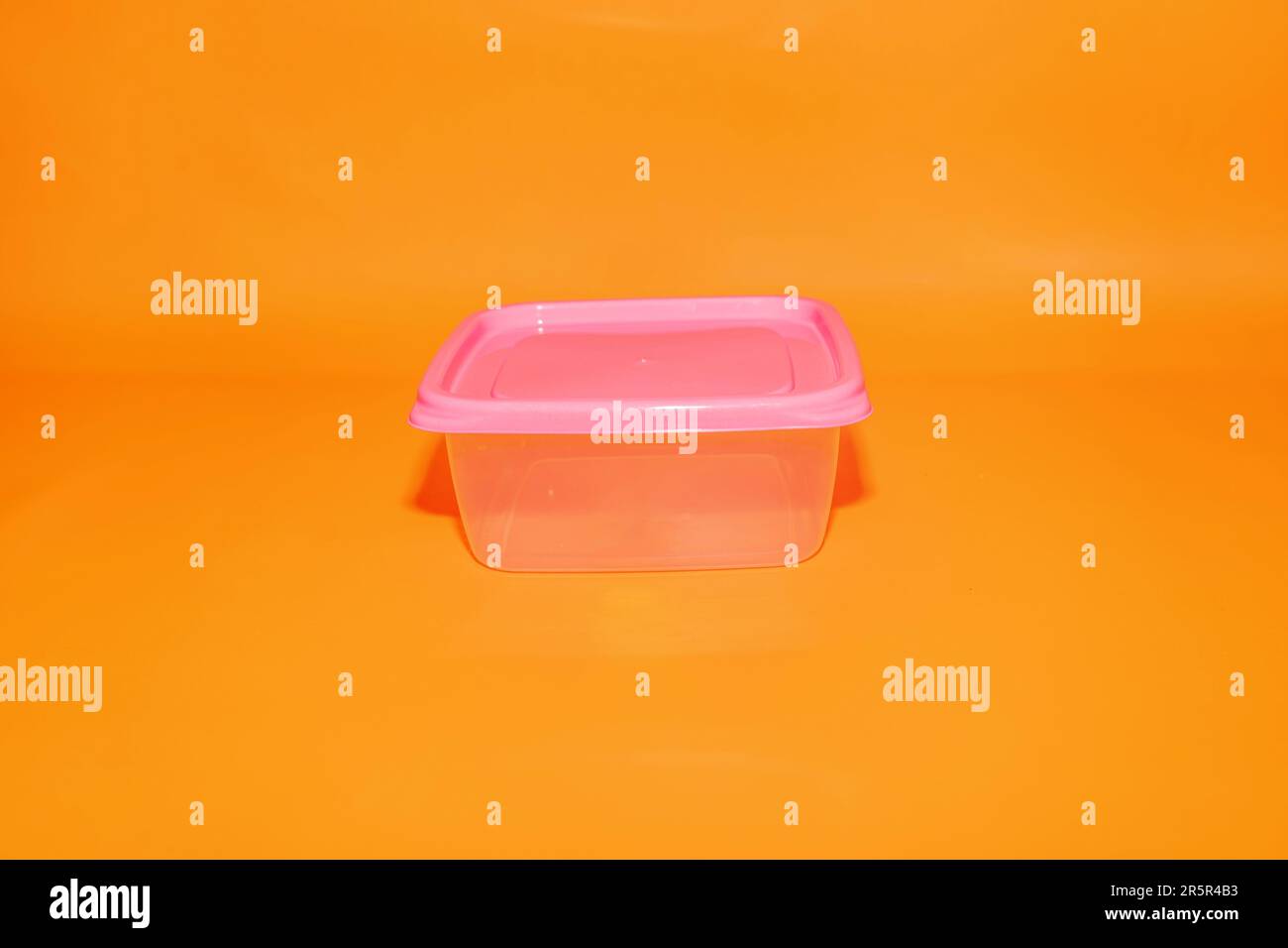 The Pink Plastic Box Container with Lid is a versatile storage solution ...