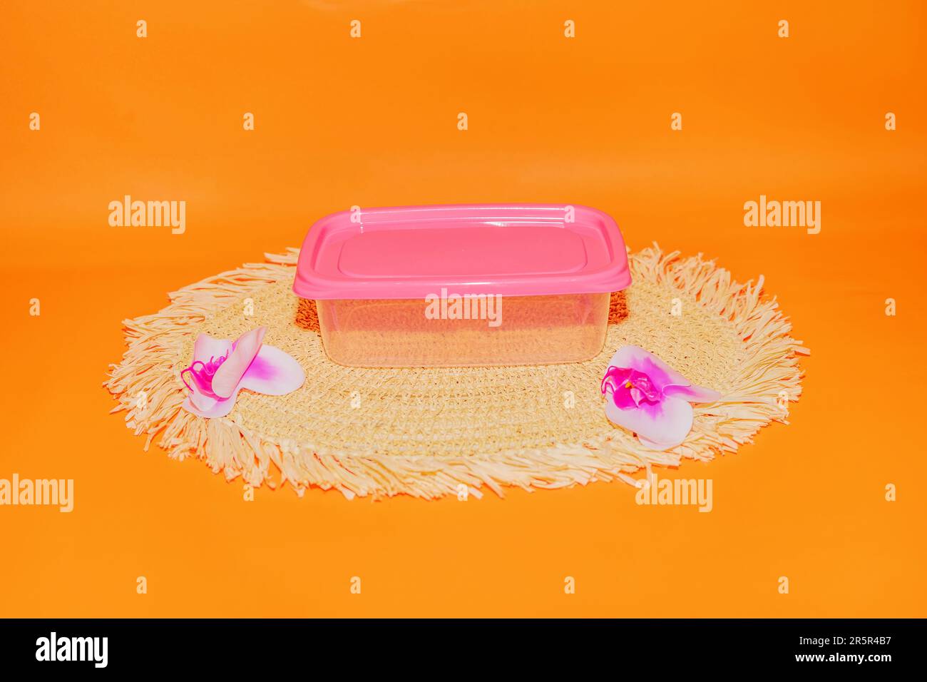 The Pink Plastic Box Container with Lid is a versatile storage solution ...