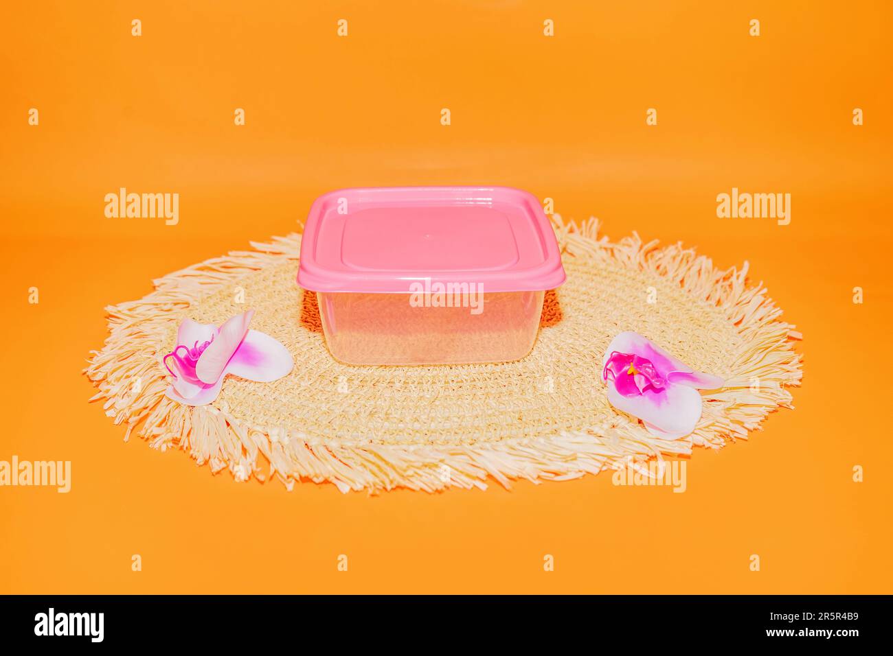 The Pink Plastic Box Container with Lid is a versatile storage solution ...