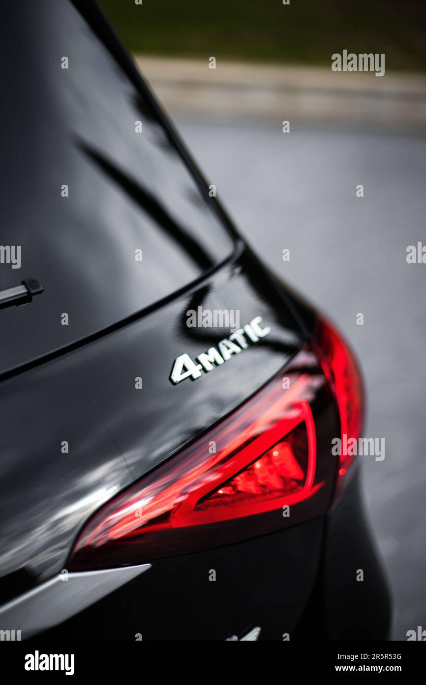 A silver Mercedes Benz AMG 300D 4MATIC parked in a driveway Stock Photo ...