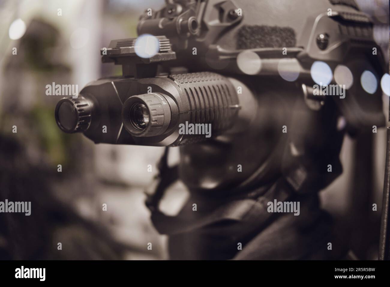 Army binoculars with night vision on a soldier's helmet. Optical device ...