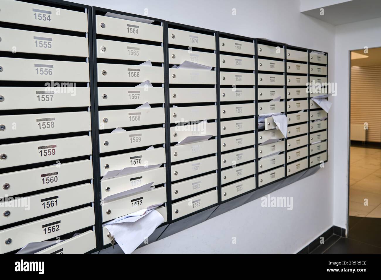 Mail post boxes in apartment hi-res stock photography and images - Alamy