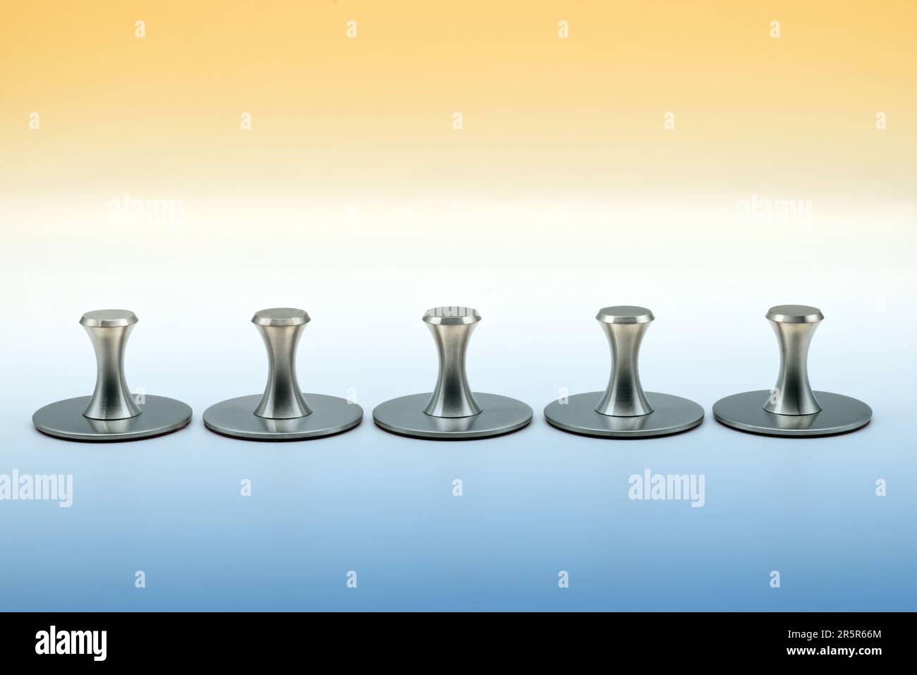 Adhesive holders in stainless steel. Self adhesive hooks Stock Photo ...