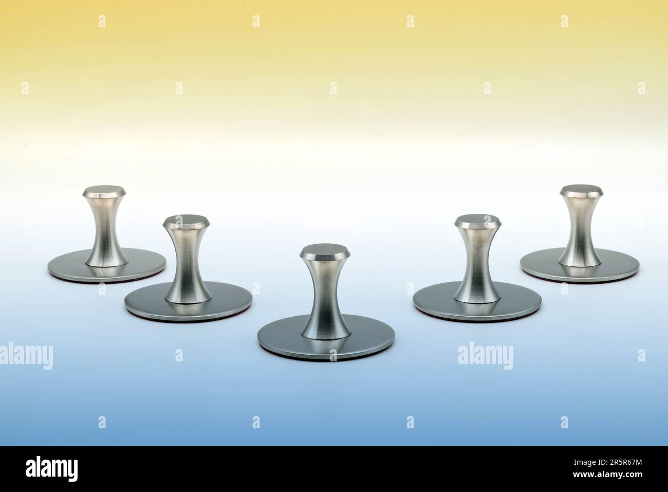 Adhesive holders in stainless steel. Self adhesive hooks Stock Photo ...